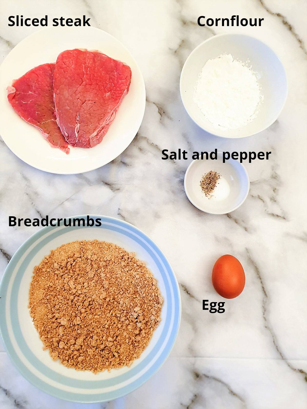 Crispy crumbed beef schnitzels - Foodle Club